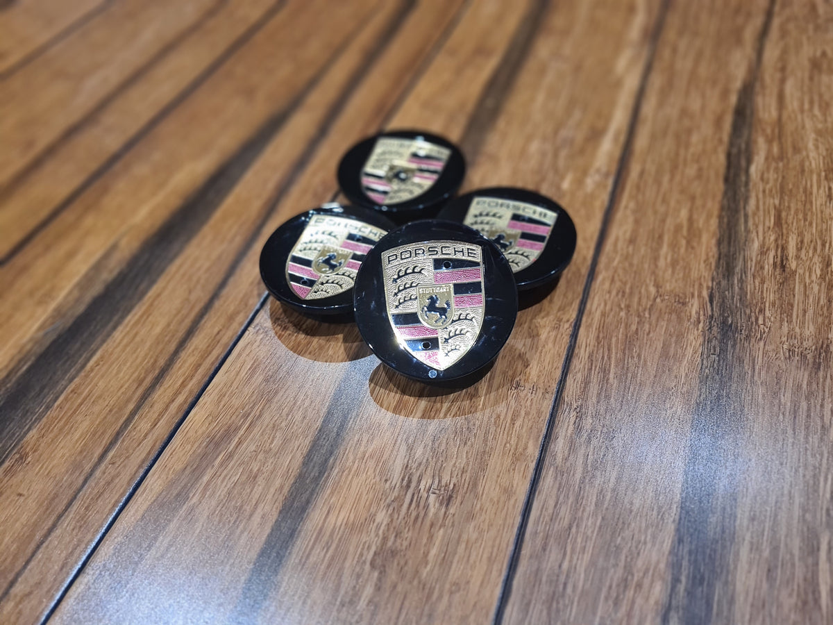 4x Alloy Wheel Centre caps for Porsche Macan Black/Gold 65mm – Caps Direct